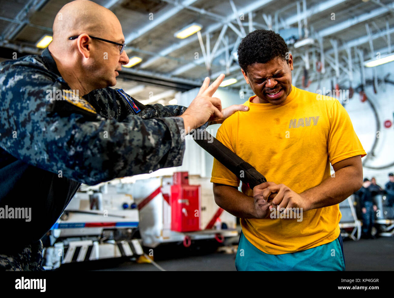 Master-at-Arms 1st Class Pasquale Miranda commands Machinist's Mate 3rd ...