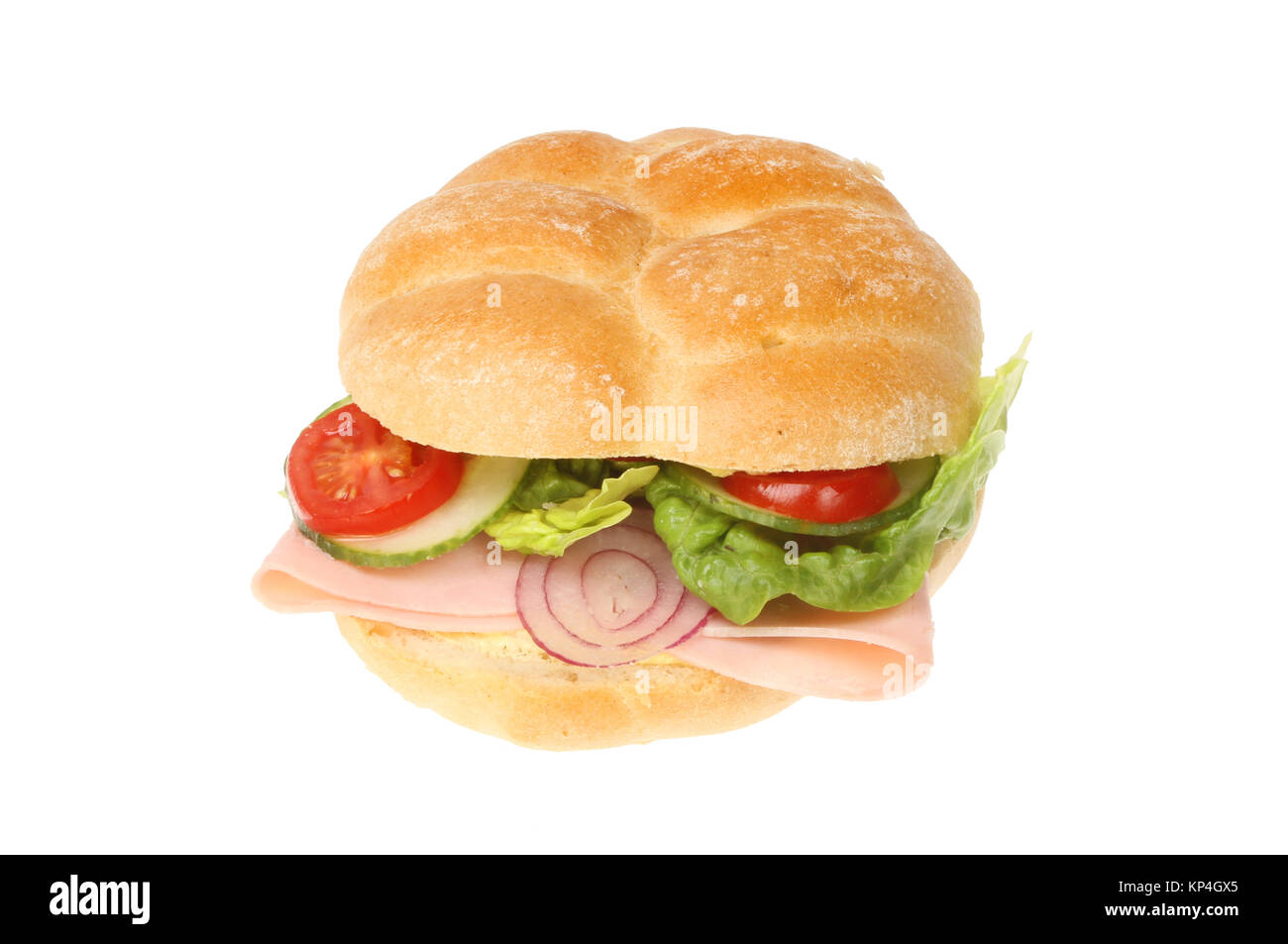 Ham and salad in a plaited bread roll isolated against white Stock ...