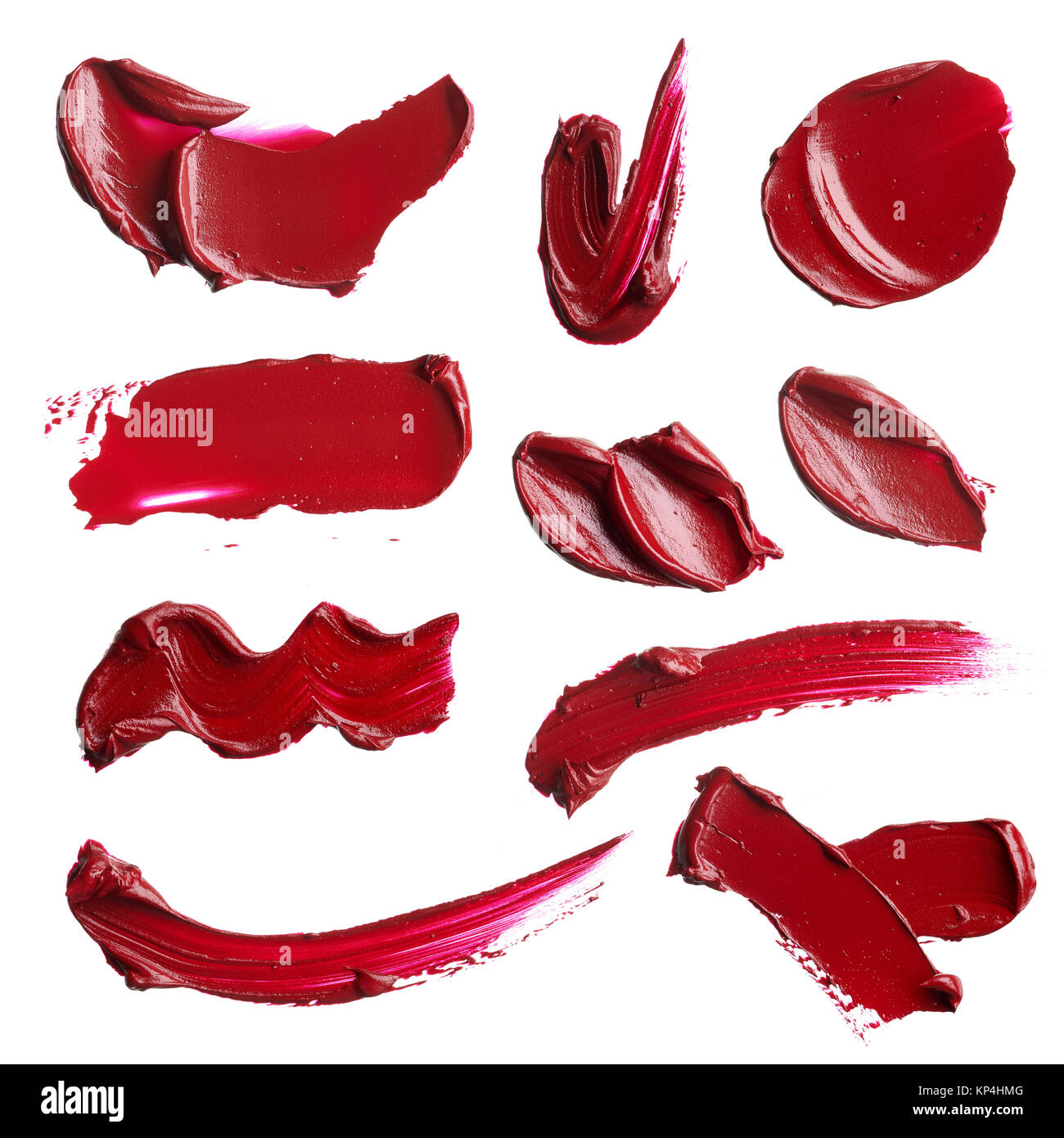 set of smears from various cosmetic products on a white background ...