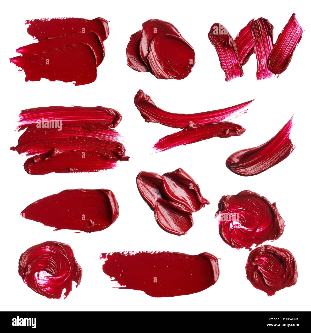 set of smears from various cosmetic products on a white background ...