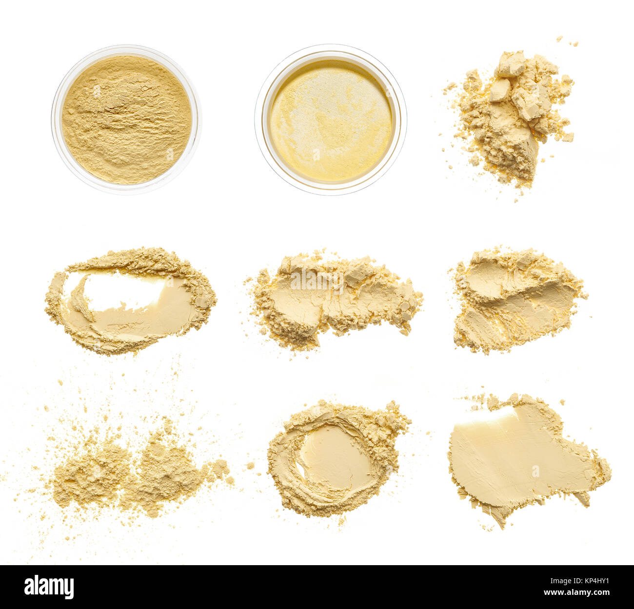 crumbled light yellow powder on white background Stock Photo - Alamy