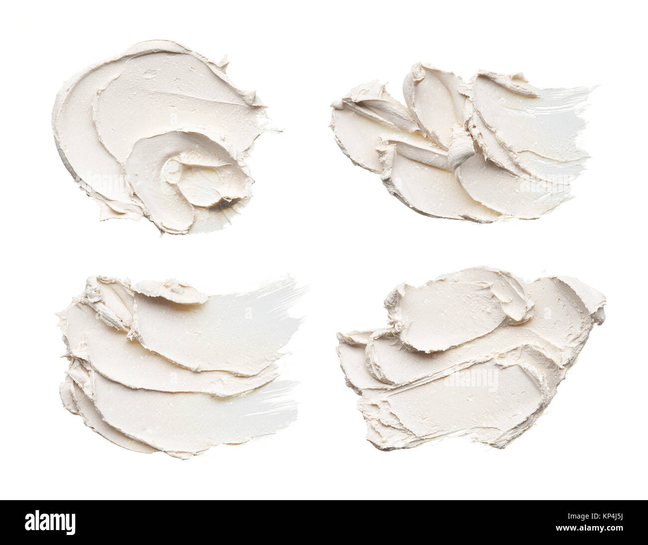 set of smears from various cosmetic products on a white background ...