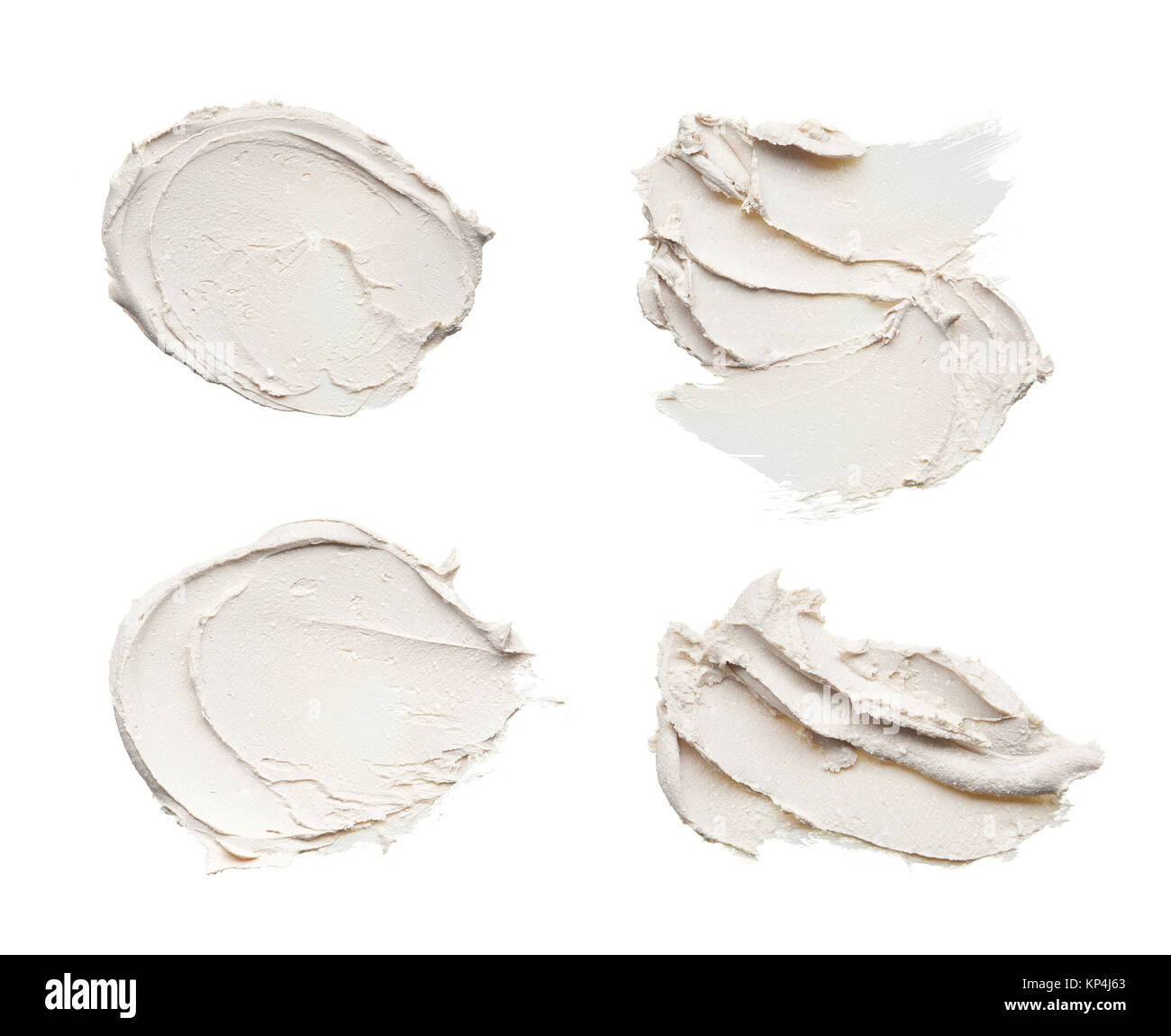 set of smears from various cosmetic products on a white background ...
