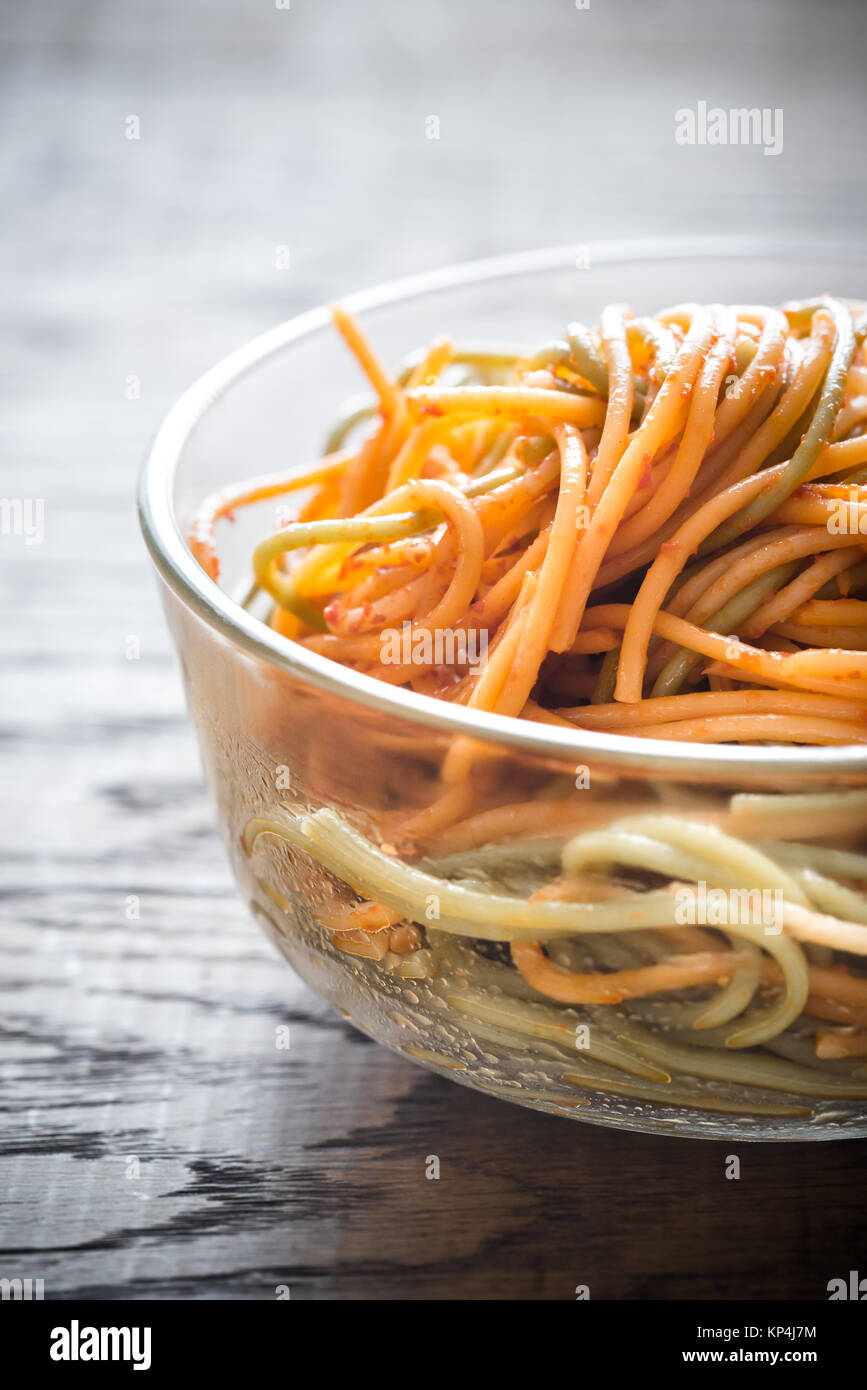 Bowl of colorful spaghetti Stock Photo - Alamy