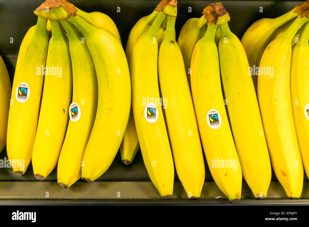 Display of Fairtrade Colombian Bananas in a UK Supermarket Stock Photo ...
