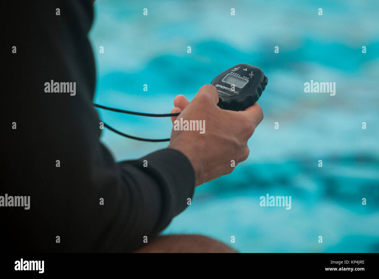 A Marine Corps Instructor of Water Survival (MCIWS) times students ...
