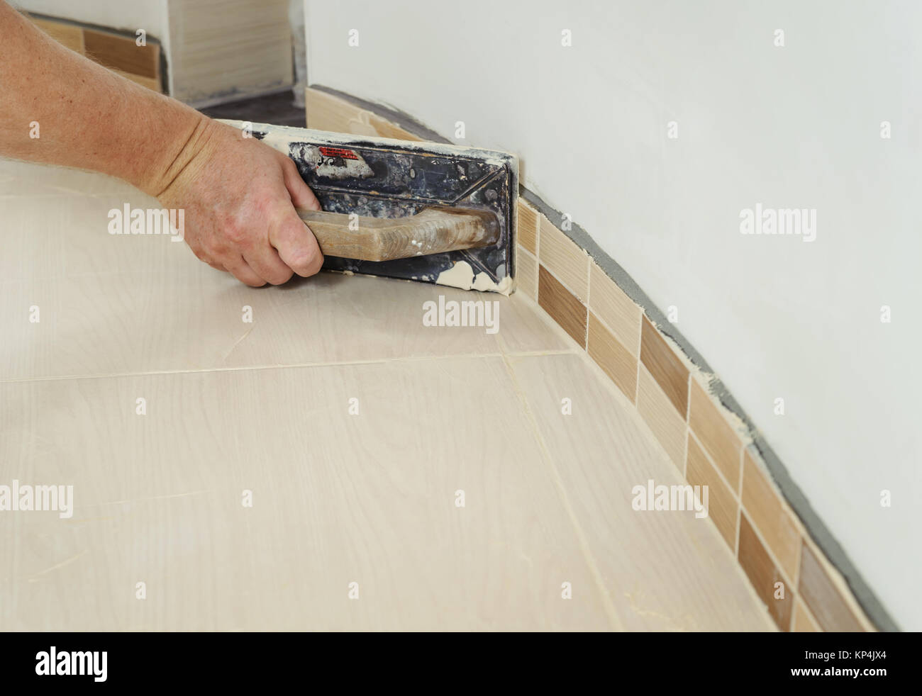 Construction worker concrete float tool hi-res stock photography and ...