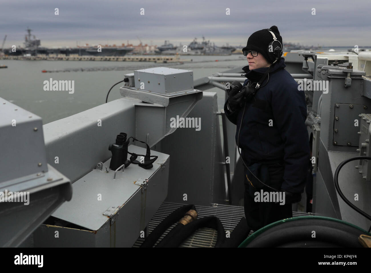 Operations Specialist 3rd Class Rachel Baynard performs the duties of ...