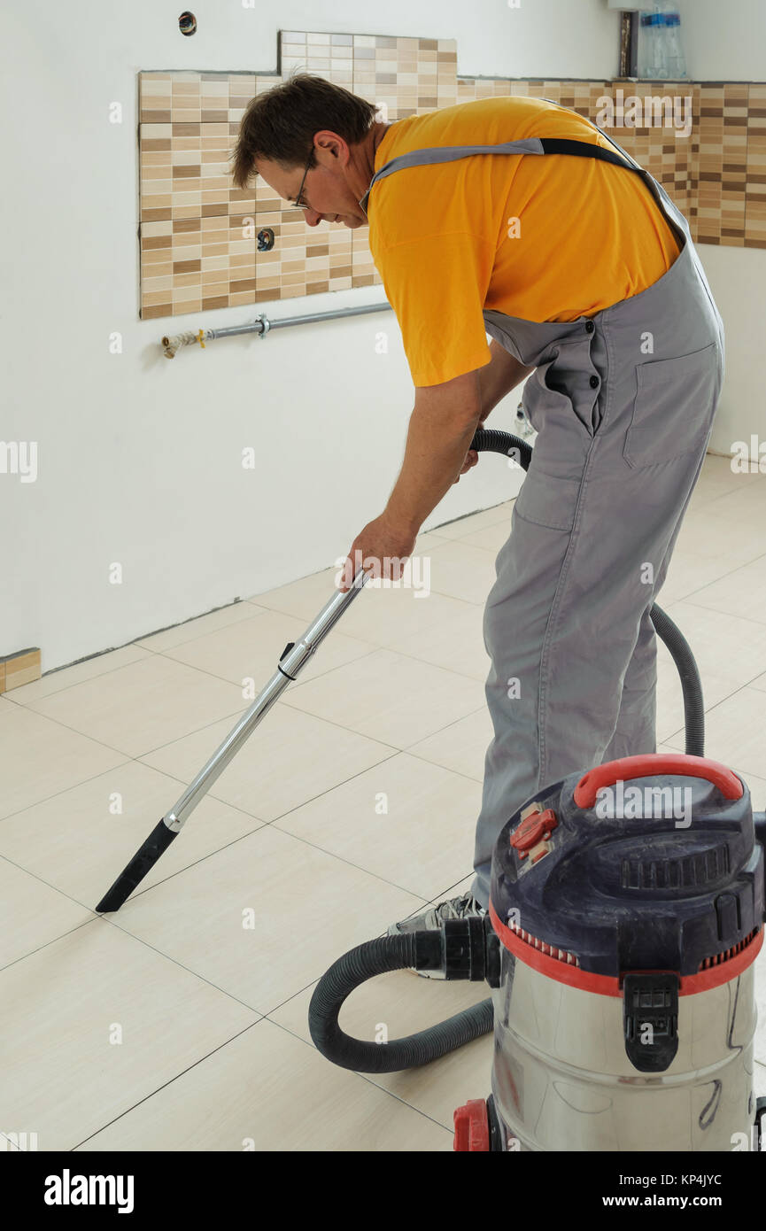 Cleaning cement floor vacuum cleaner hi-res stock photography and ...