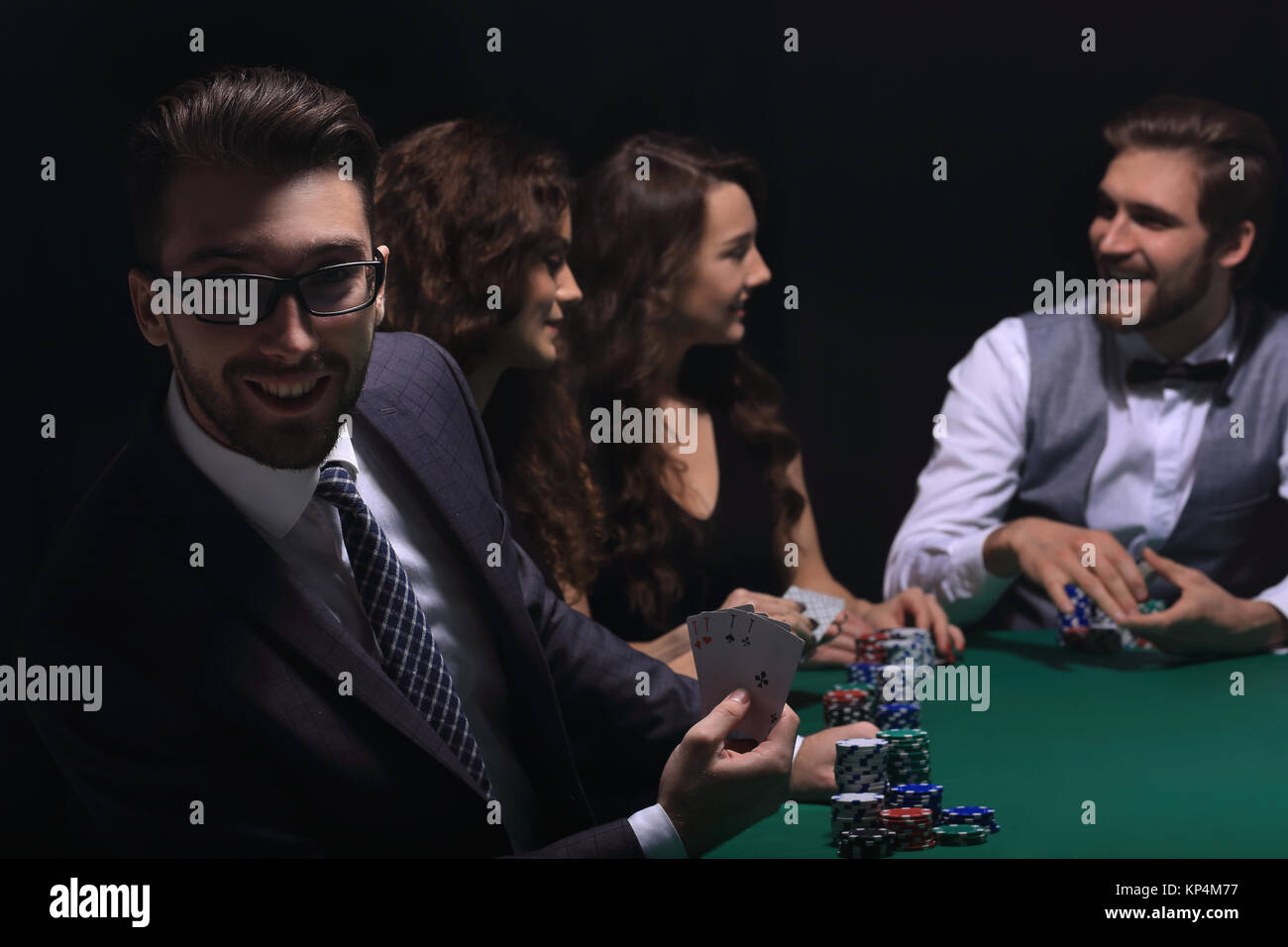 Modern businessman playing poker hi-res stock photography and images ...