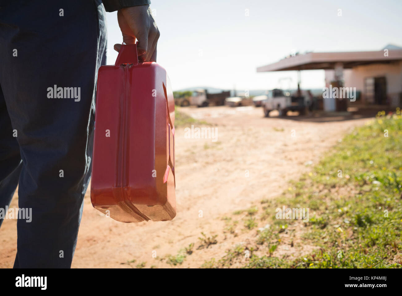 Man walking gas can hi-res stock photography and images - Alamy