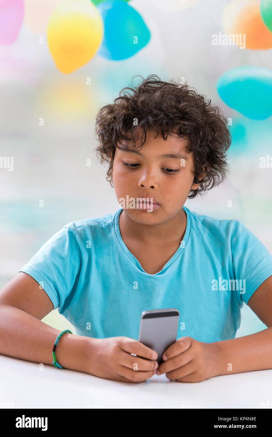 CHILD WITH PHONE Stock Photo - Alamy