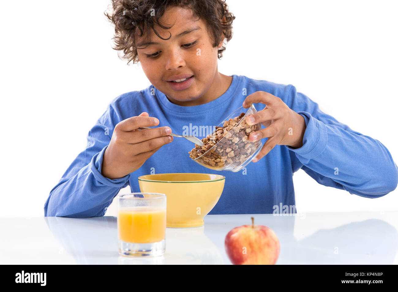 6 year old boy eating breakfast hi-res stock photography and images - Alamy