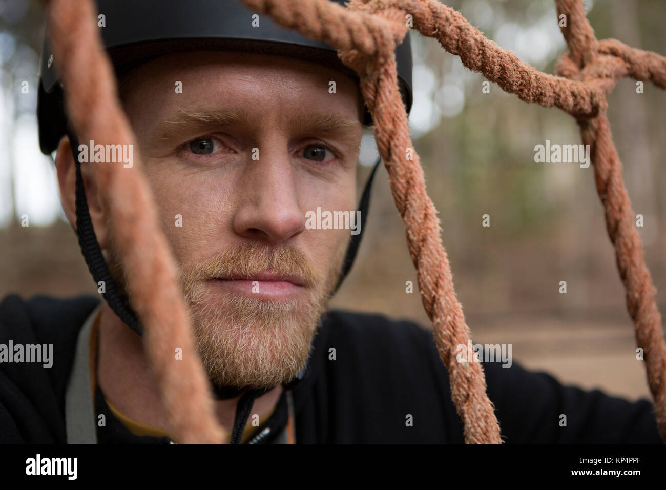 Woman through fence hi-res stock photography and images - Alamy