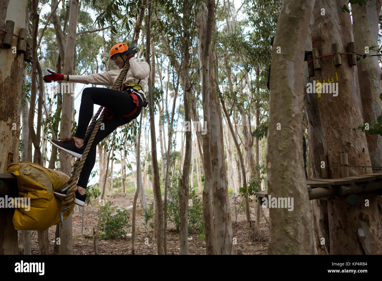 Swinging on rope hi-res stock photography and images - Alamy