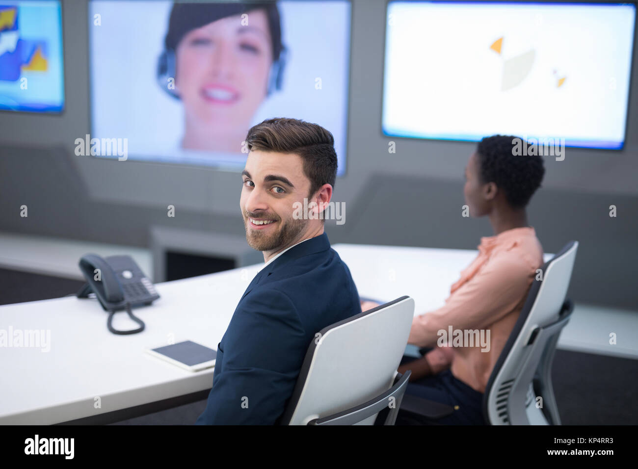 Executive having video call in boardroom at office Stock Photo - Alamy