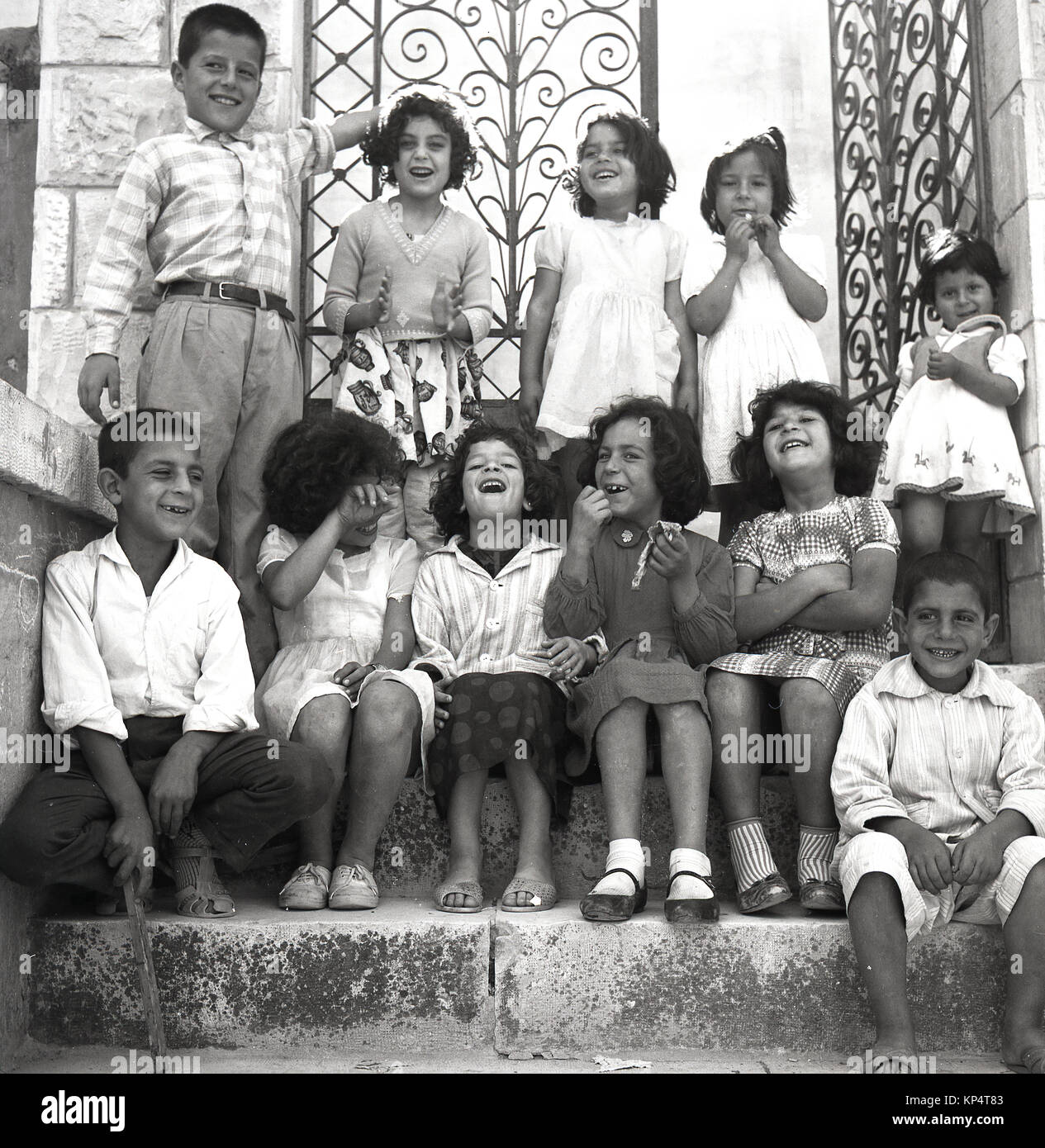1950s, Jordan, historical picture showing a group of jordanian children ...