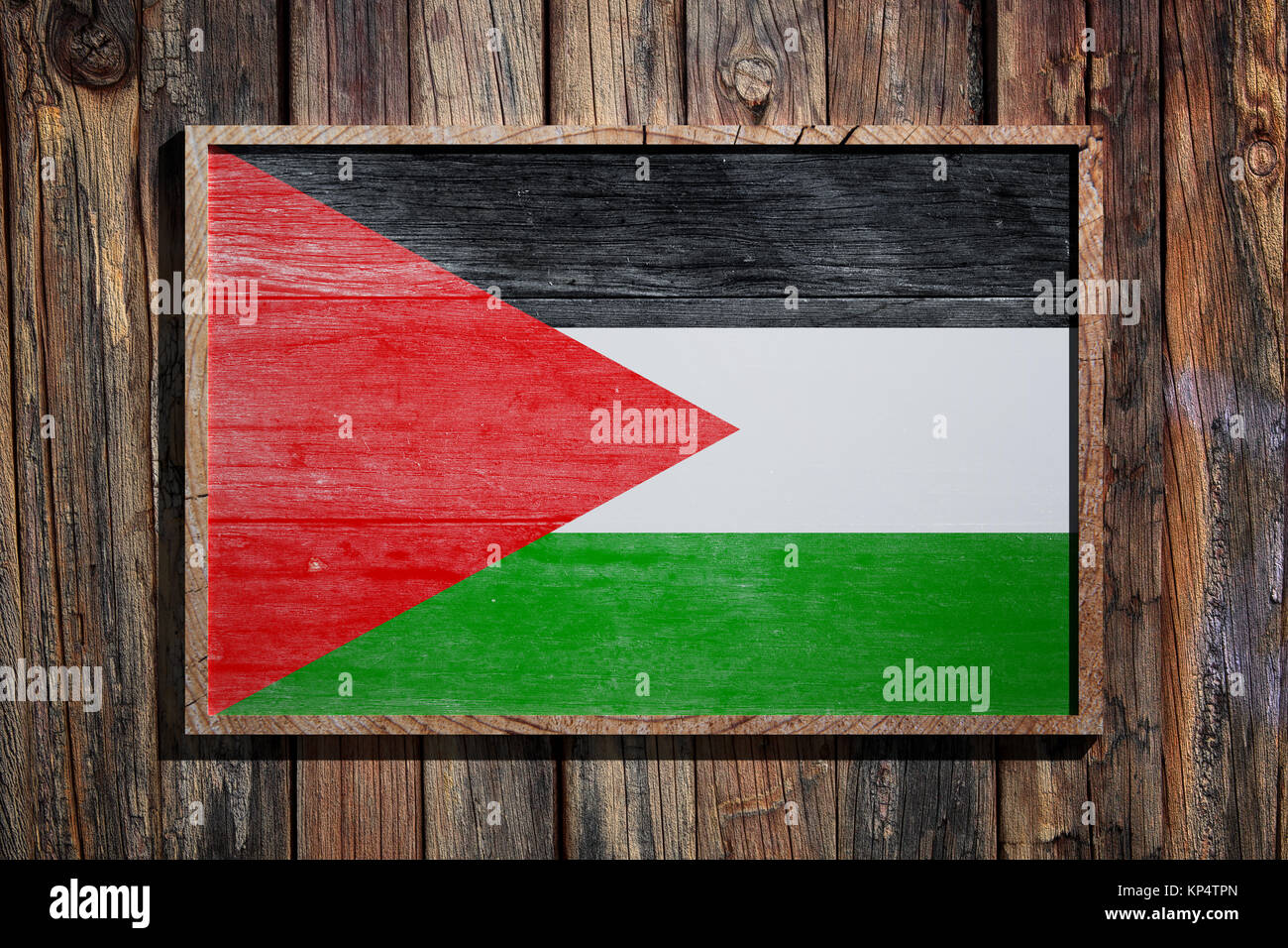3d rendering of Palestine flag on a wooden frame over a planks wall ...