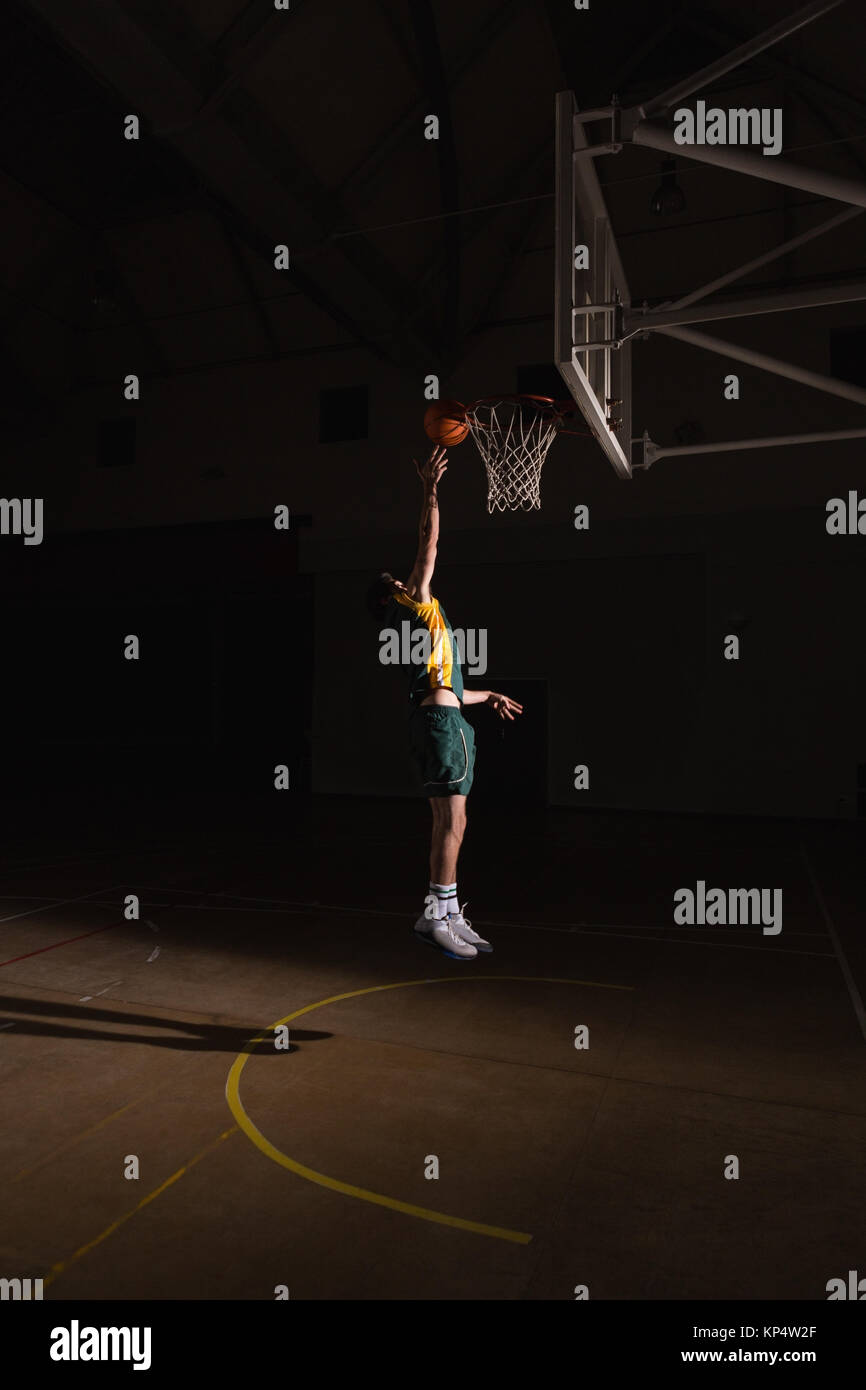 Basketball player throwing ball stadium hi-res stock photography and ...