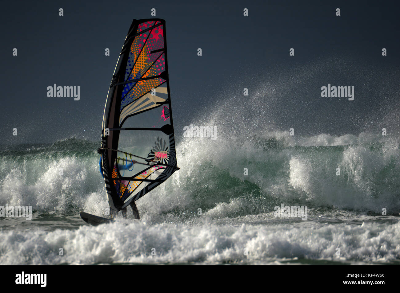 Windsurfer in breaking waves at Gwithian. Cornwall Stock Photo - Alamy