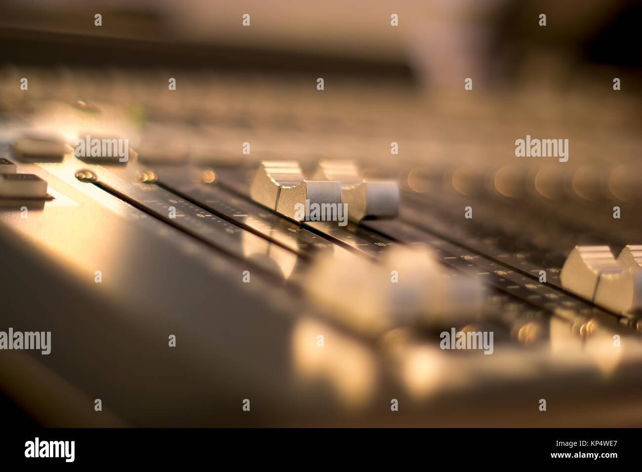 Audio mixer faders close up shot Stock Photo - Alamy