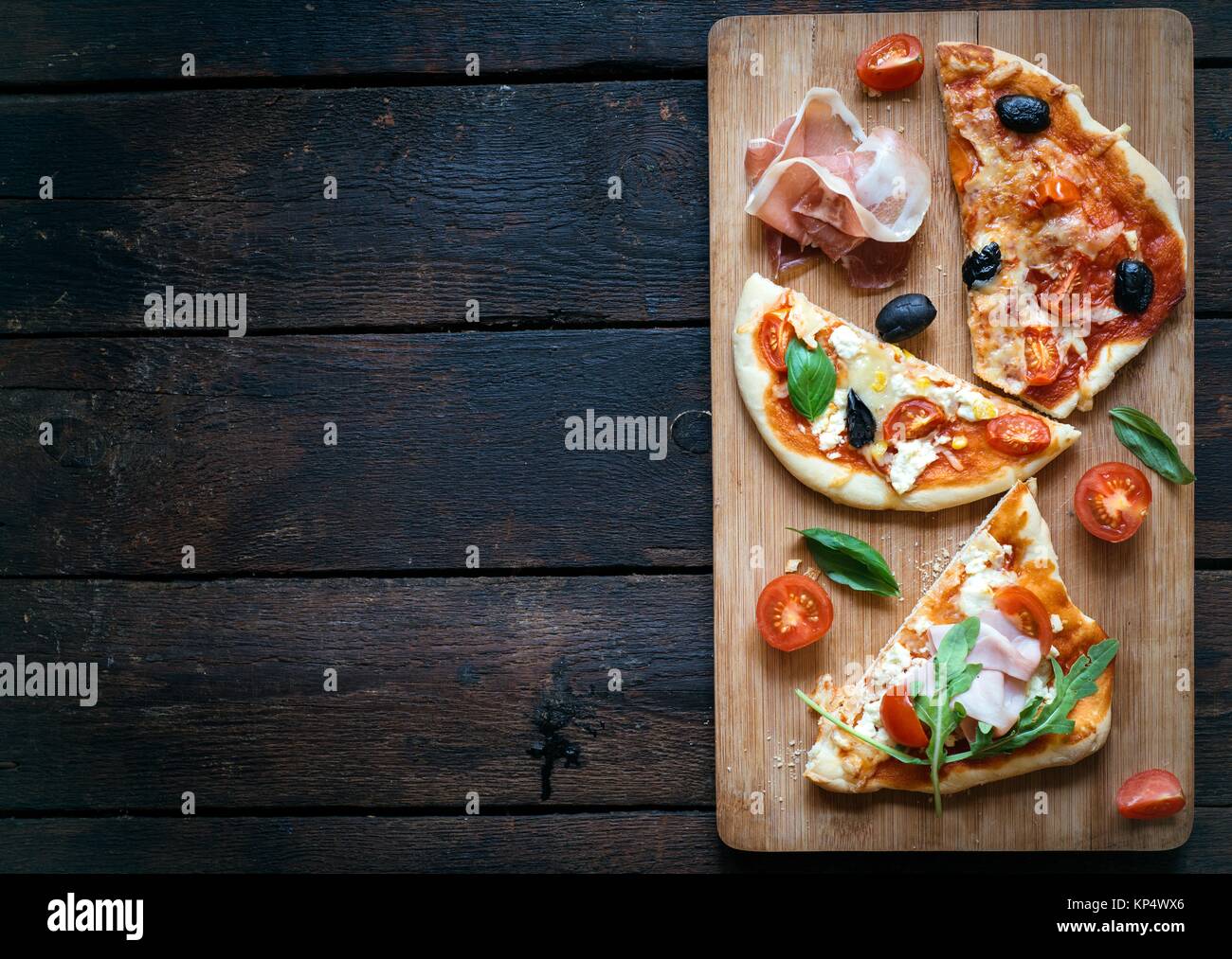 Slices of mini pizza Stock Photo - Alamy