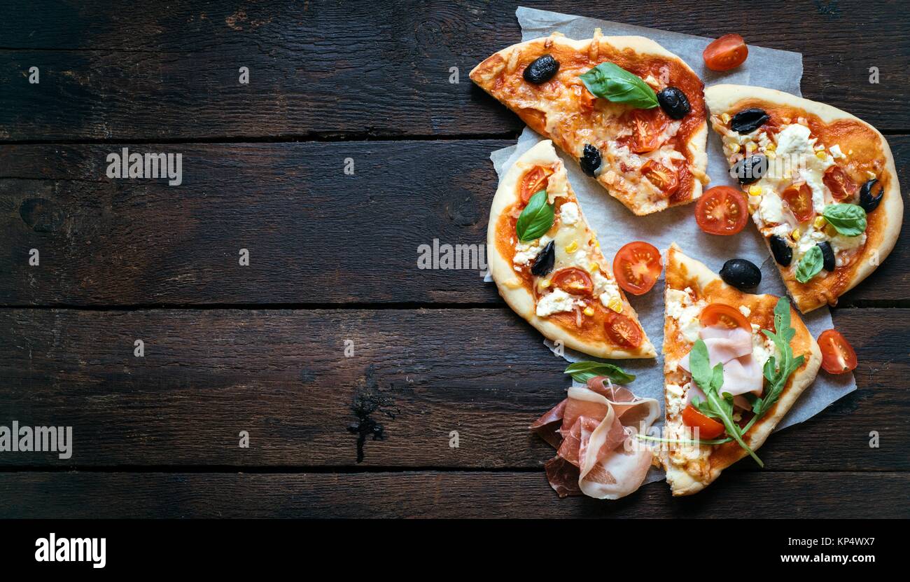 Slices of mini pizza Stock Photo - Alamy