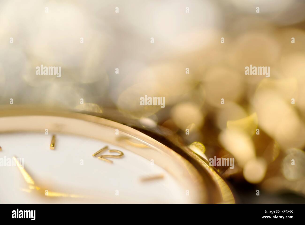 Detail of a golden watch Stock Photo - Alamy