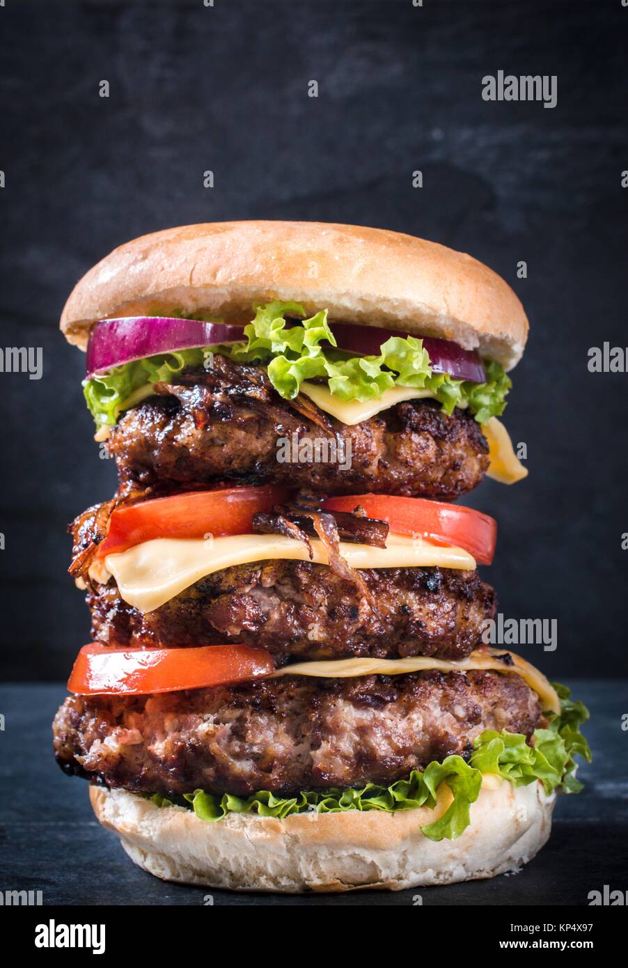 Triple cheeseburger hi-res stock photography and images - Alamy