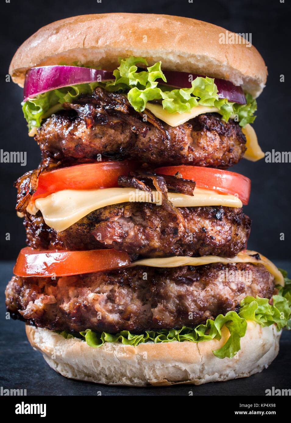 Triple cheeseburger hi-res stock photography and images - Alamy