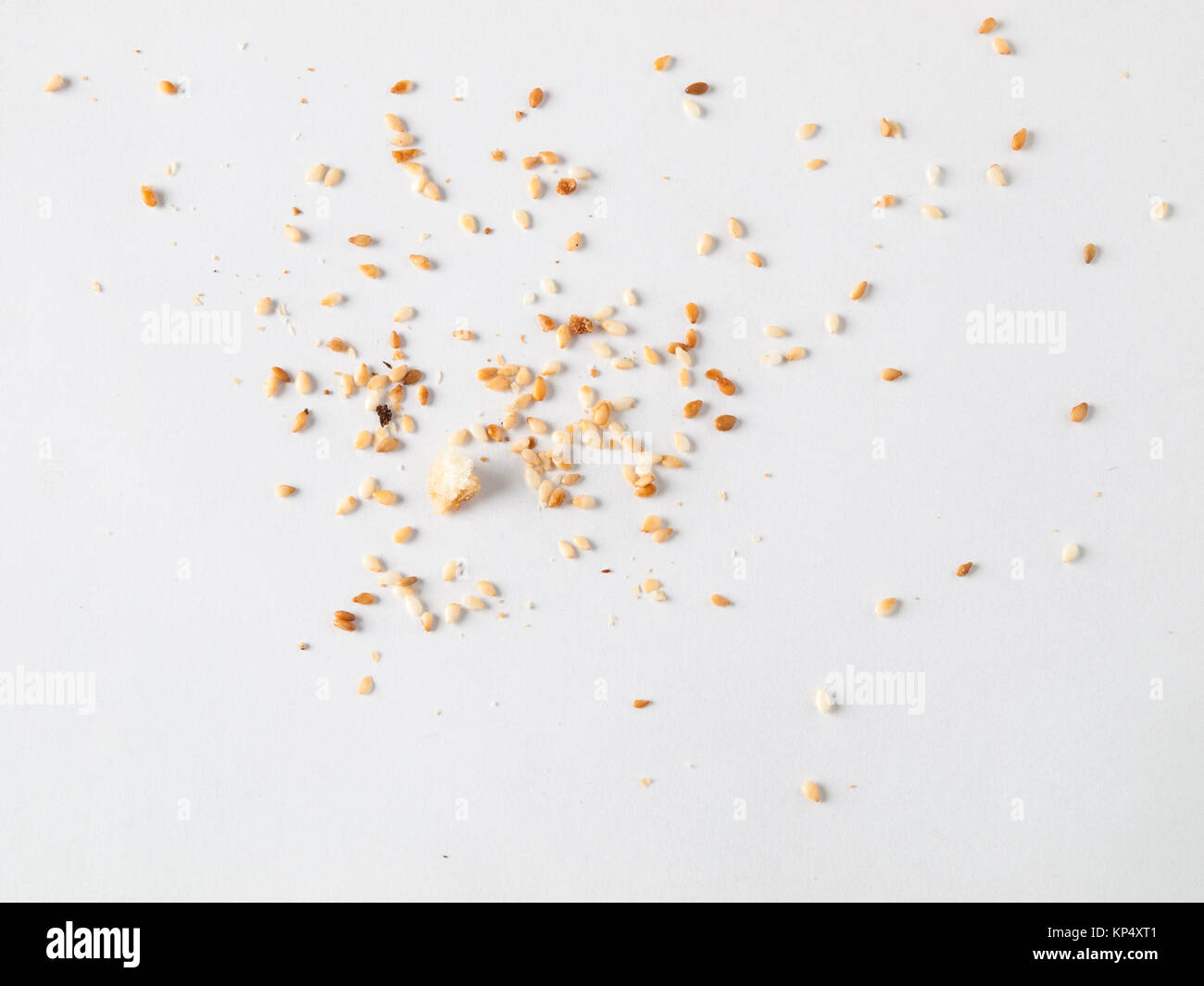 Scattered sesame seeds and crumbs isolated on white background Stock ...