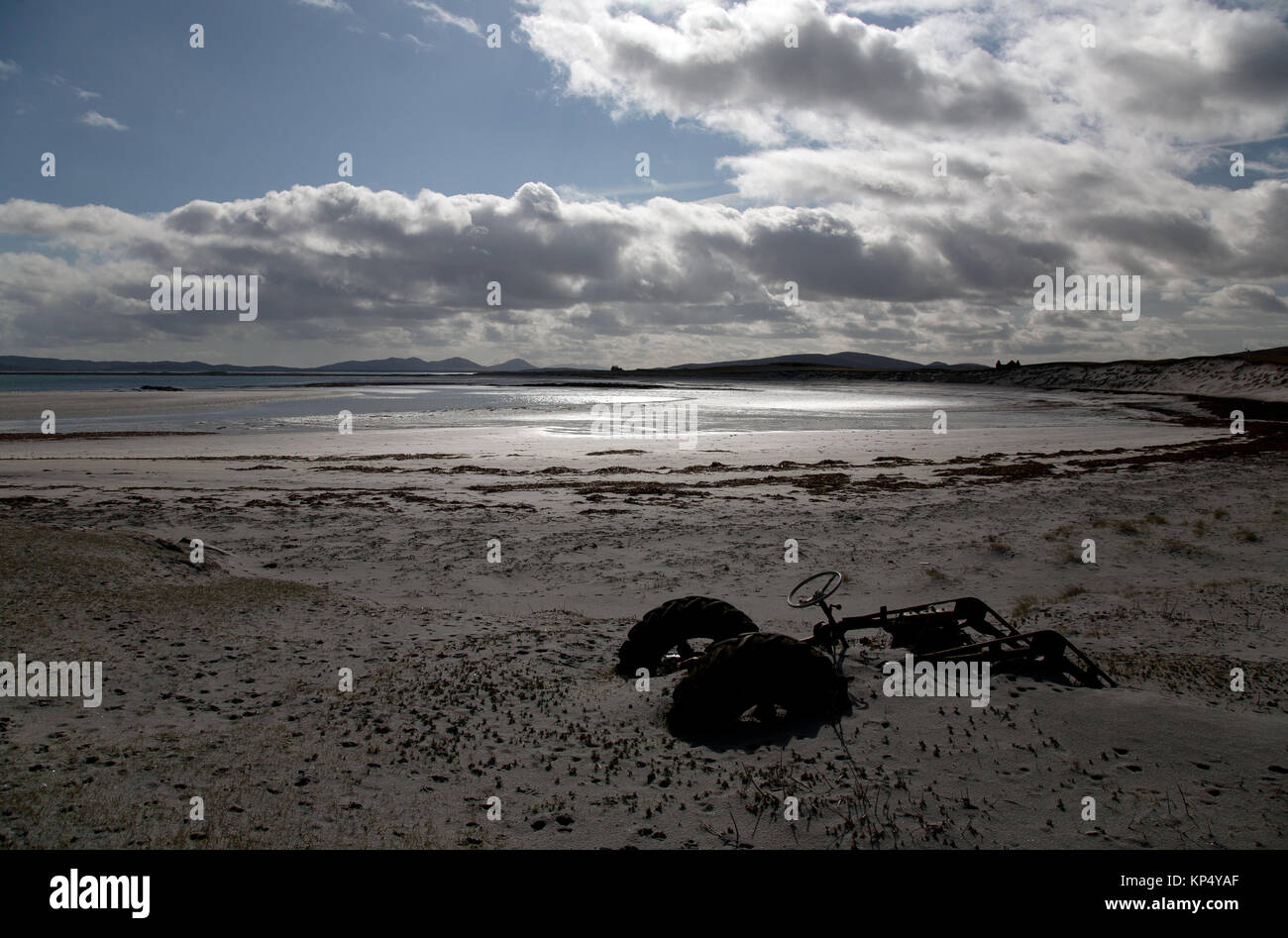 Buried tractor on beach, Berneray, North Uist, Outer Hebrides Stock ...