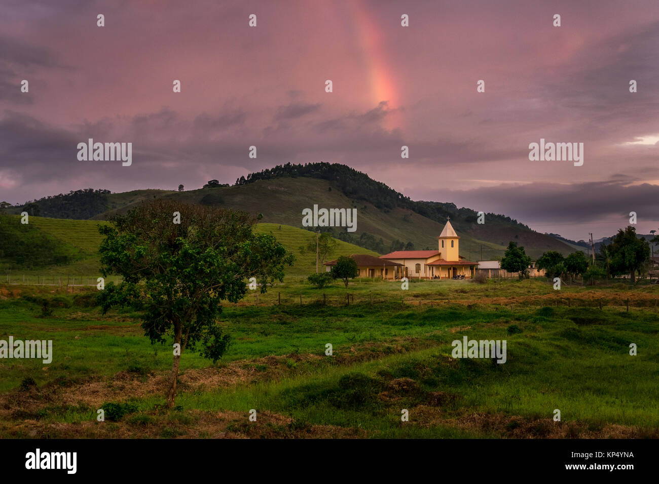 Rainbow with church hi-res stock photography and images - Alamy