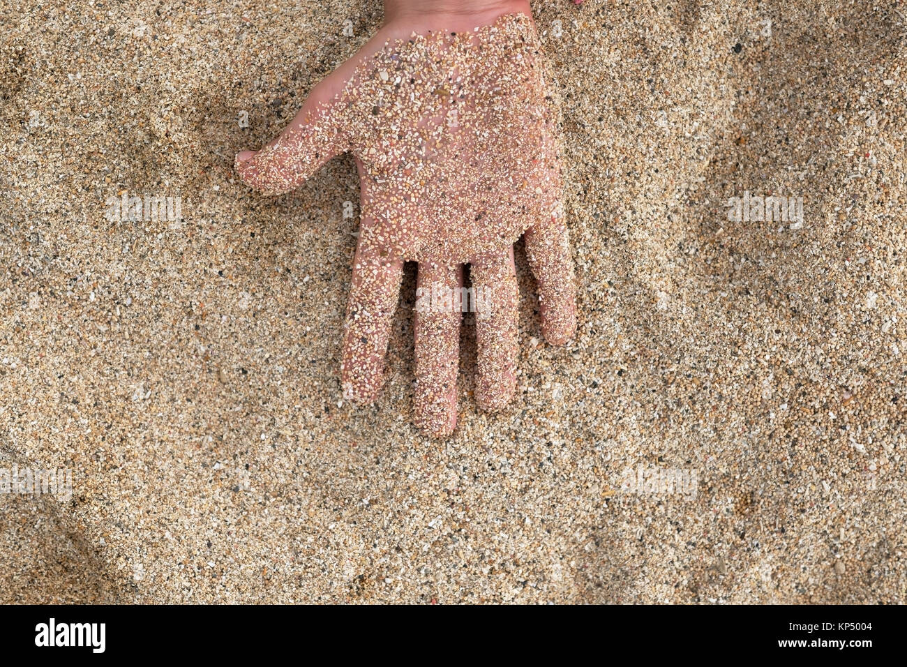 Hand and sand hi-res stock photography and images - Alamy