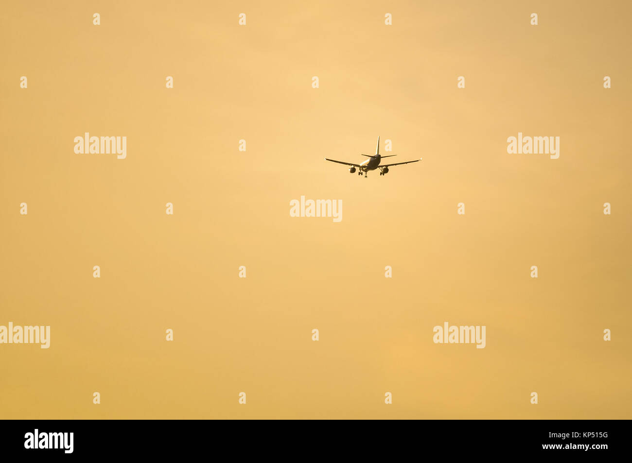 Airplane approaching an airport Stock Photo - Alamy