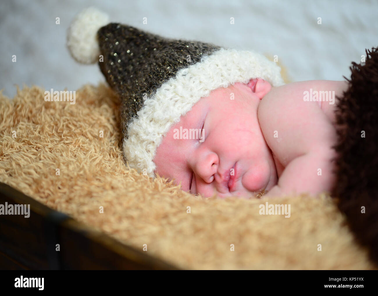 Sleeping baby with cap Stock Photo - Alamy
