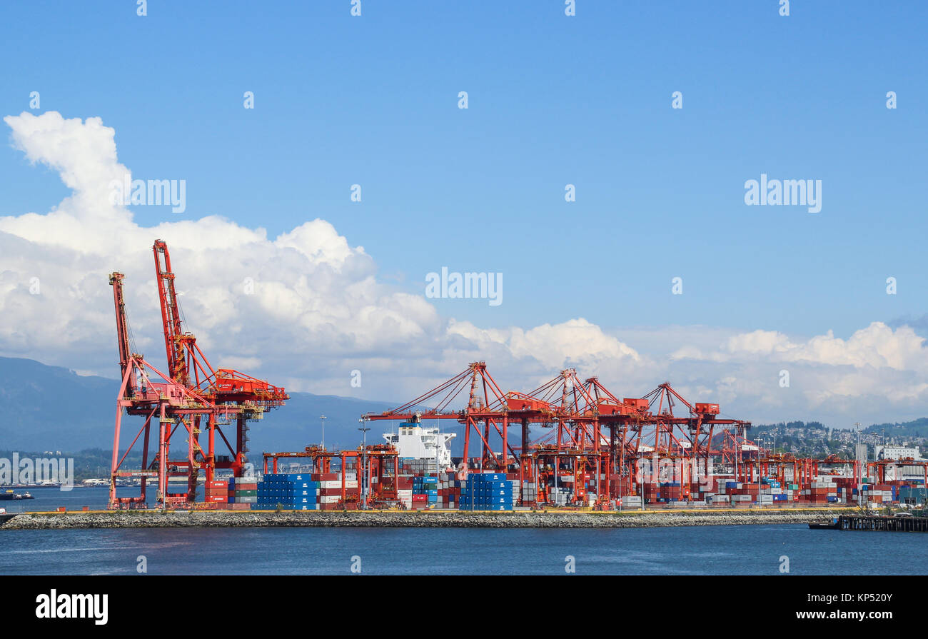 Harbor cranes in the container port. View from Coal Harbour. British ...