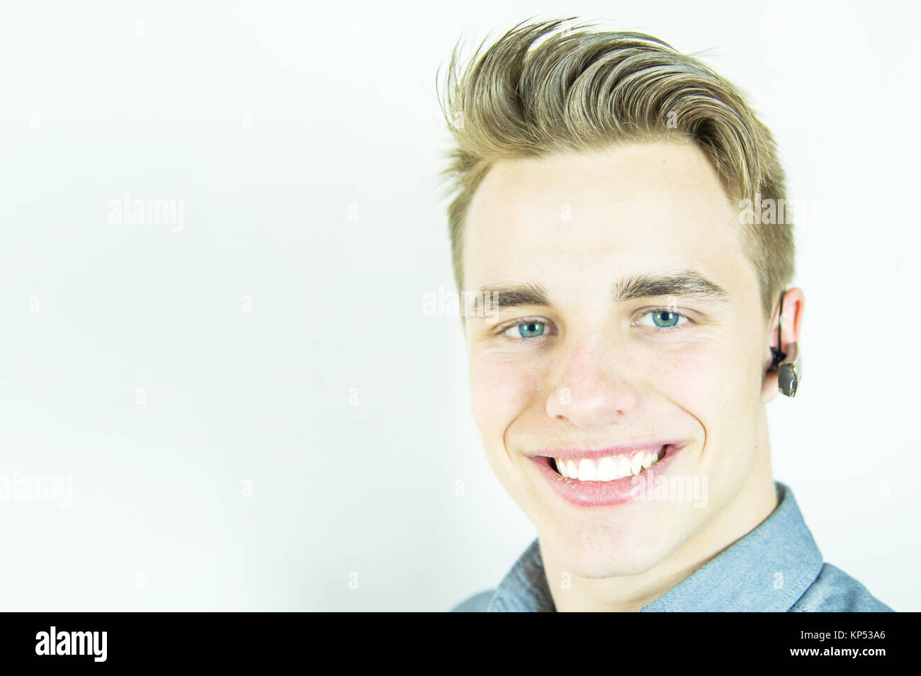 Handsome customer service agent smiling portrait Stock Photo - Alamy
