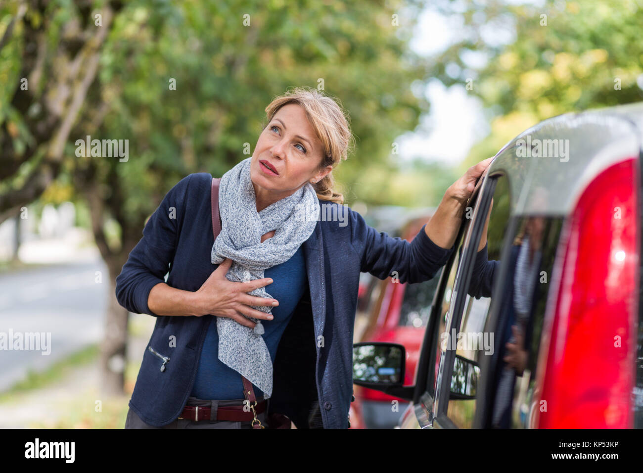 Woman experiencing about of dizziness or feeling faint Stock Photo - Alamy