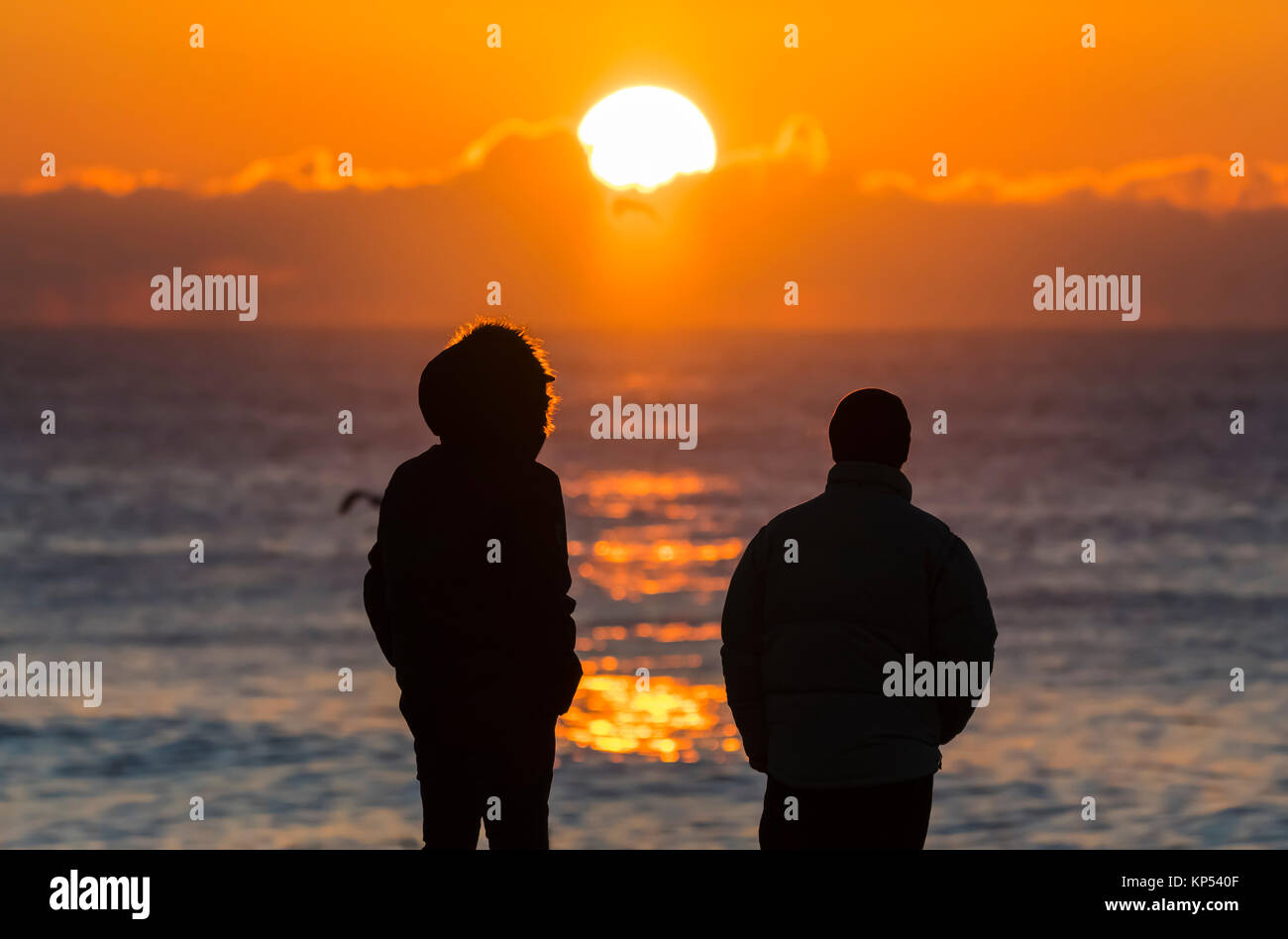 Standing watching sun rise hi-res stock photography and images - Alamy