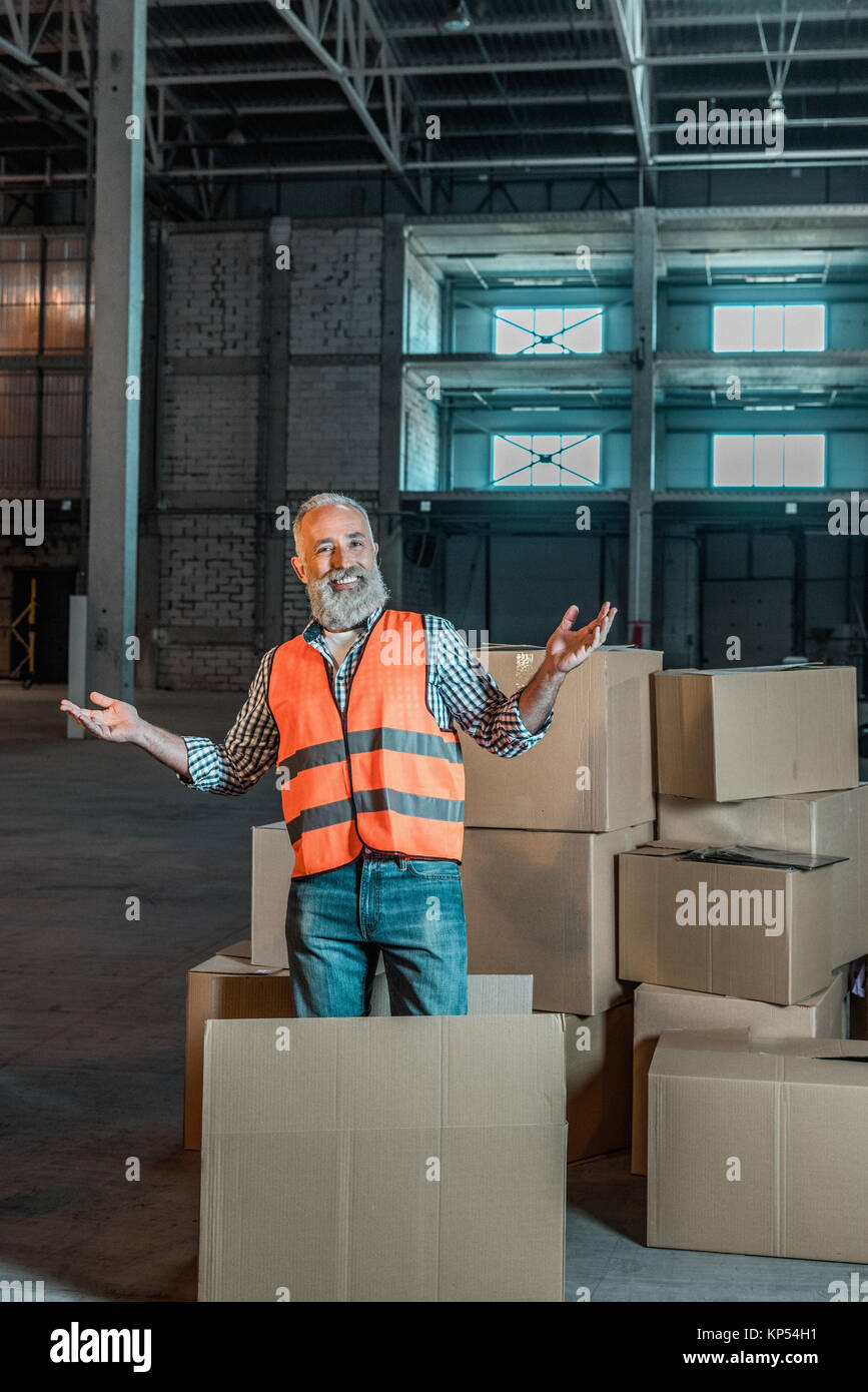 cheerful warehouse worker Stock Photo - Alamy