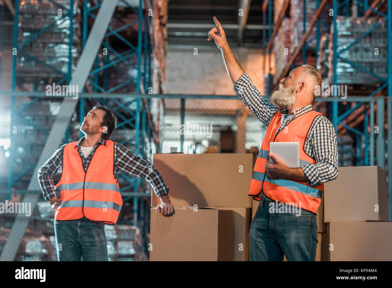 warehouse workers with digital tablet Stock Photo - Alamy