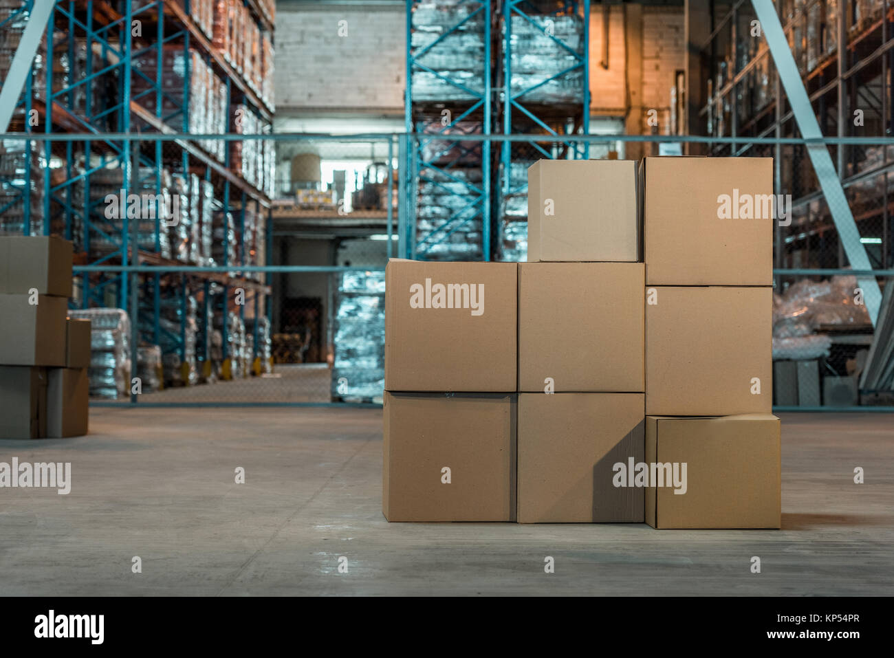 boxes in warehouse Stock Photo - Alamy