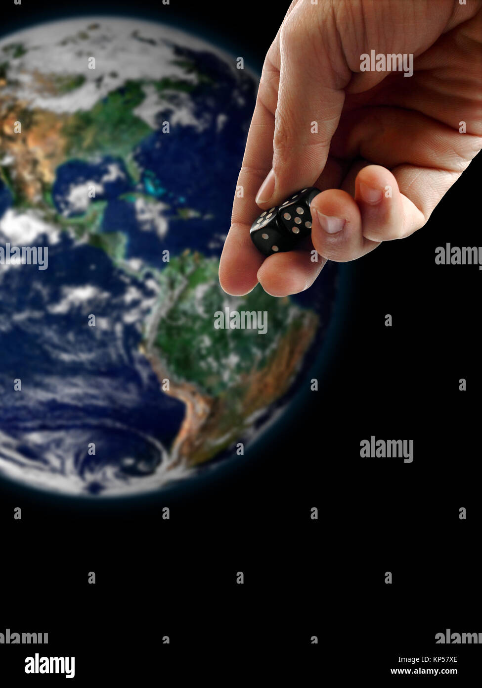 Dice and the earth Stock Photo - Alamy