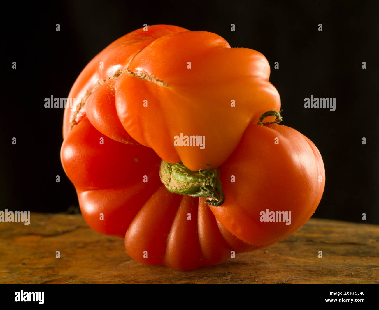a strange tomato in an artistic way Stock Photo - Alamy