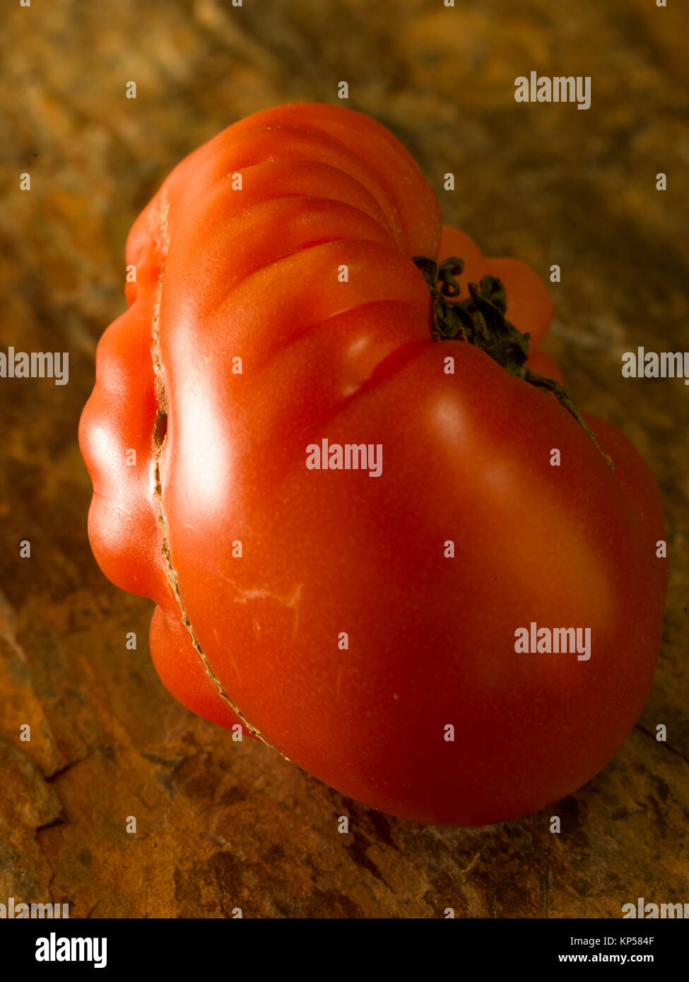 a strange tomato in an artistic way Stock Photo - Alamy