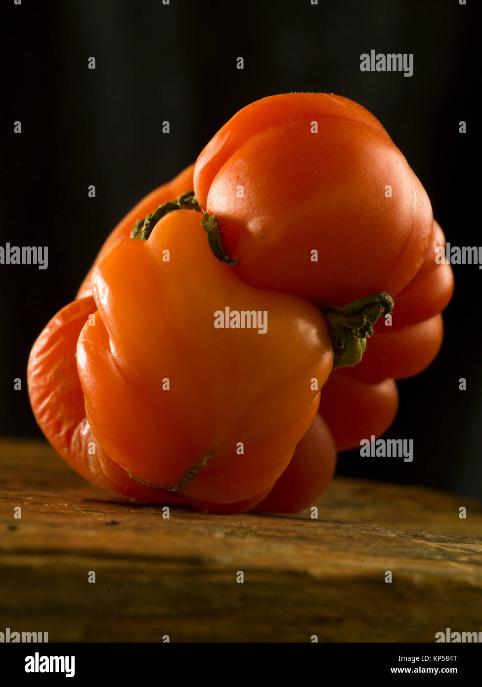 a strange tomato in an artistic way Stock Photo - Alamy
