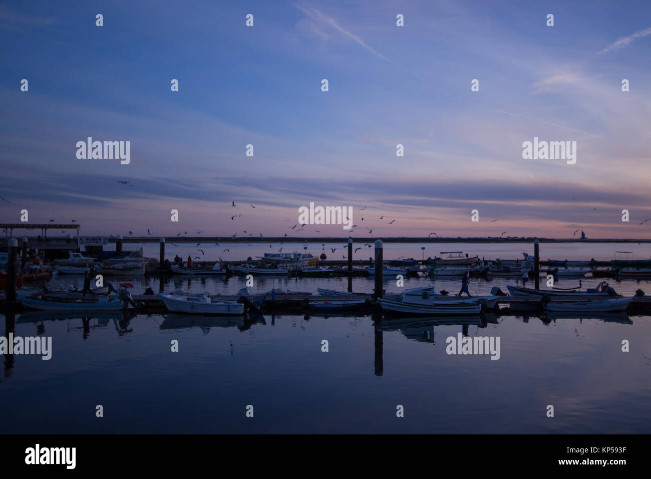 fishing port at dusk Algarve Portugal seascape Stock Photo - Alamy