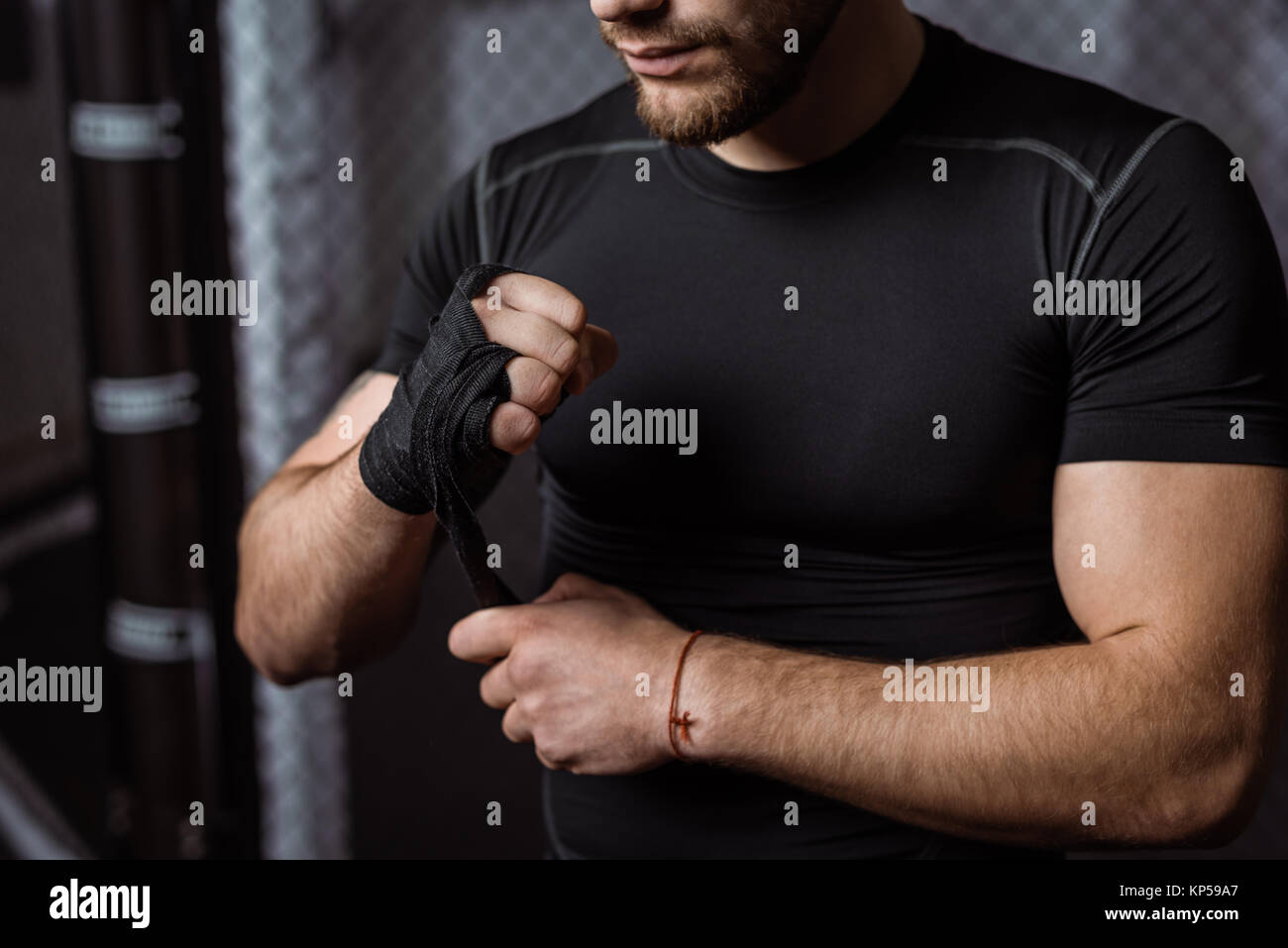 boxer wrapping hand with bandage Stock Photo - Alamy