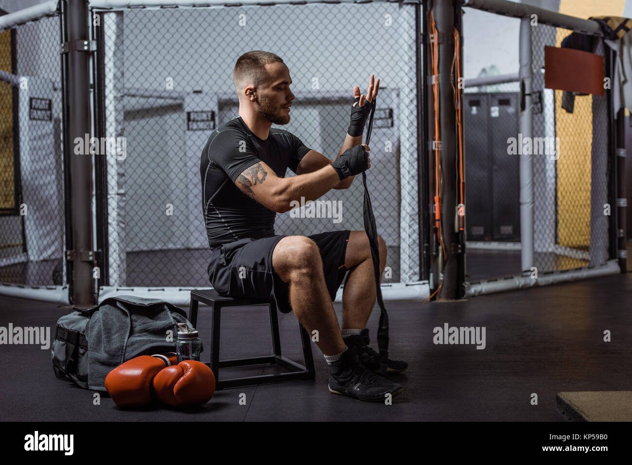boxer wrapping hands with bandages Stock Photo - Alamy